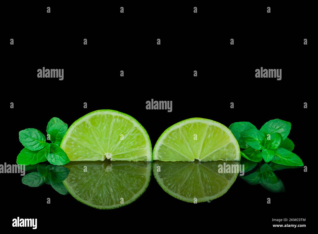 Still life, lemon and lime on black background Stock Photo - Alamy