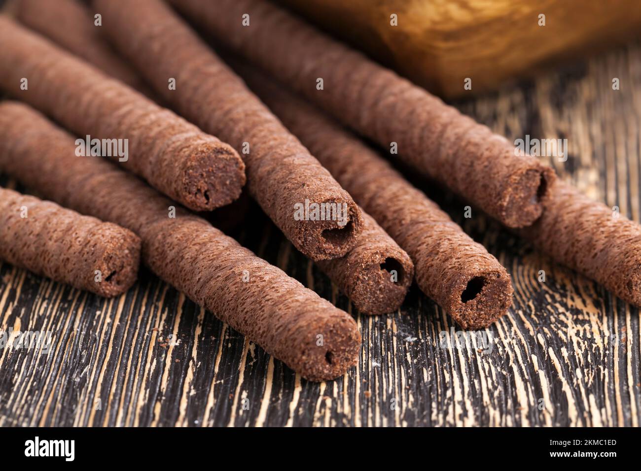 chocolate tubes with chocolate filling, dessert of chocolate waffle ...