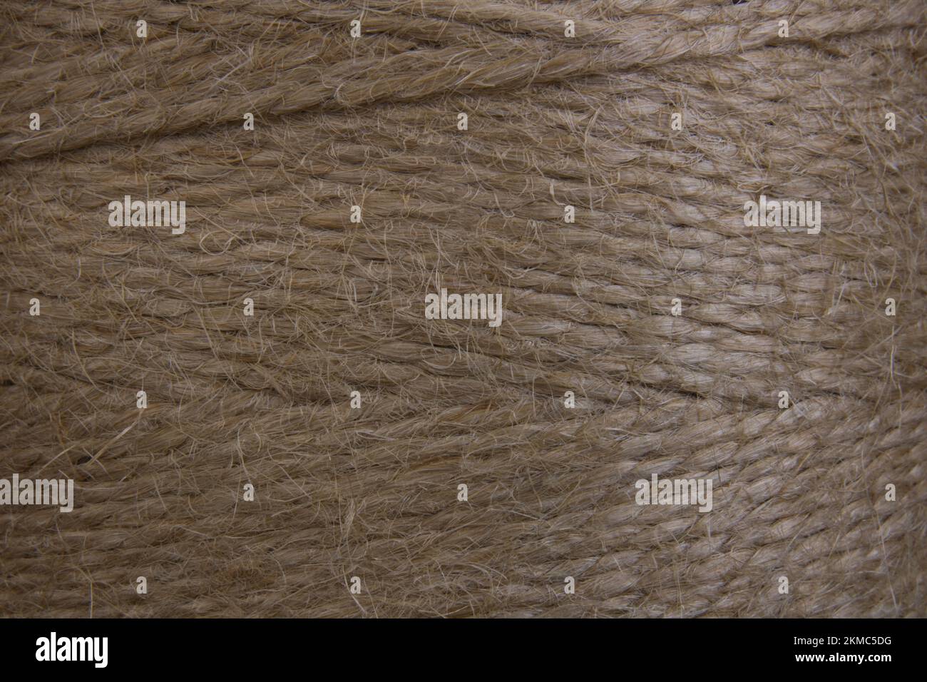 Skein of coarse brown twine, closeup. Background texture. Environmental ...