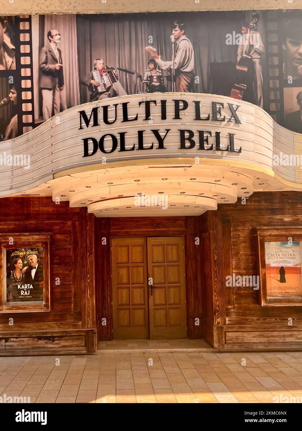 A street with the old movie theater Cineplexx in village Andricgrad in Visegrad in sunny weather ...