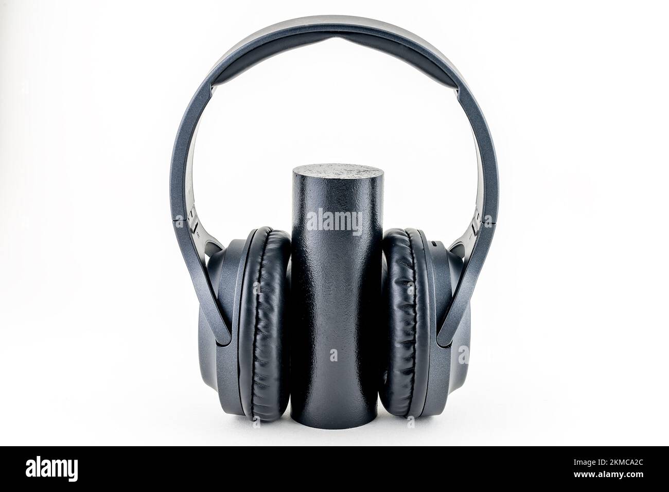 black headphones on white background Stock Photo - Alamy