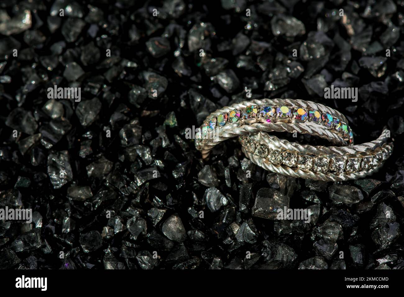 Photo of golden set with gems over dark background Stock Photo - Alamy