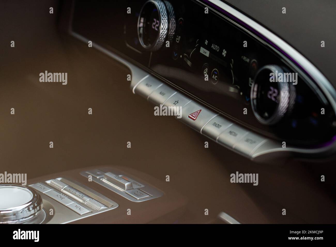 Red triangle hazard light button on car dashboard. Car media buttons ...