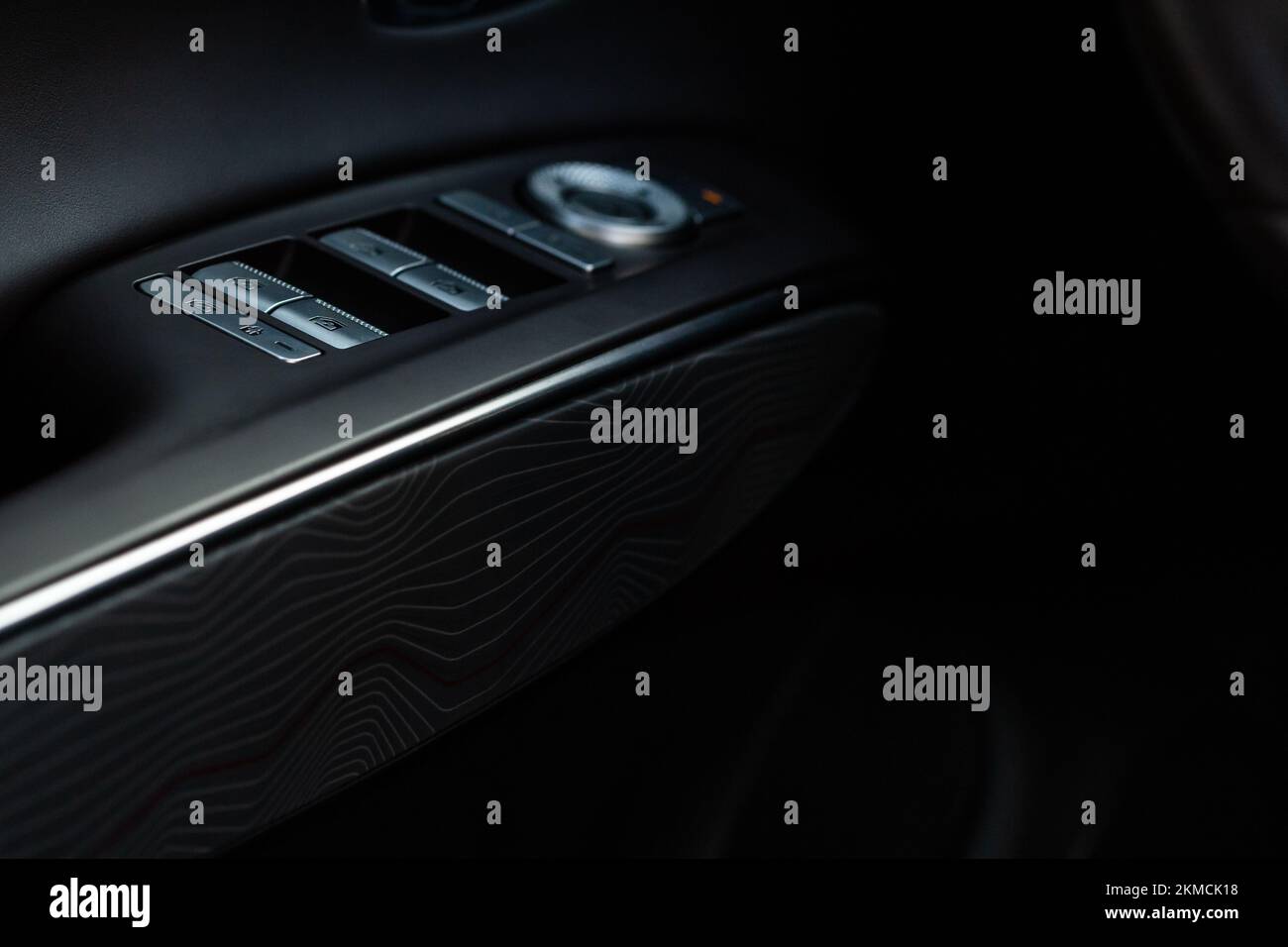 Modern car interior close up view with metallic and plastic details ...