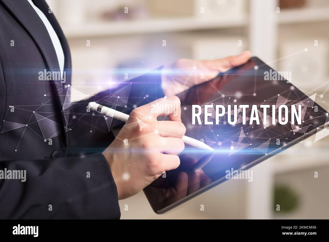 Close up hands using tablet Stock Photo - Alamy