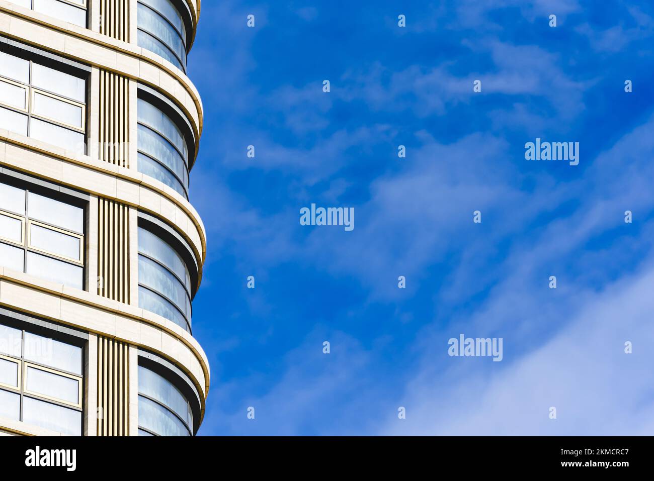 Facade of modern office building on blue sky background Stock Photo - Alamy