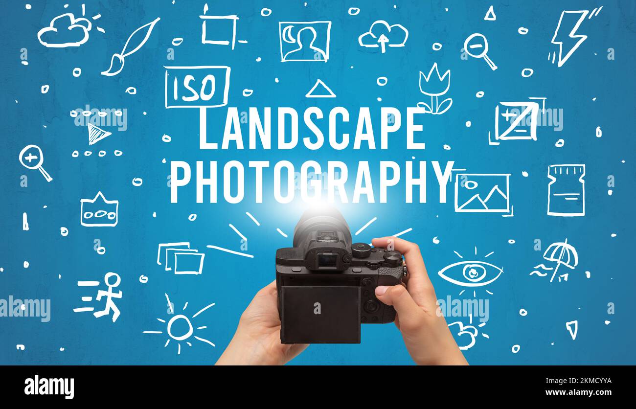 Hand taking picture with digital camera Stock Photo - Alamy