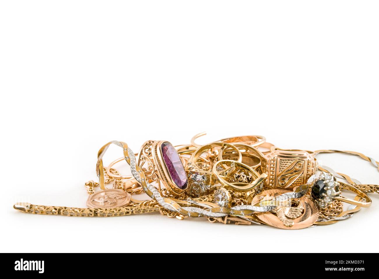 Photo of golden set with gems over white background Stock Photo - Alamy