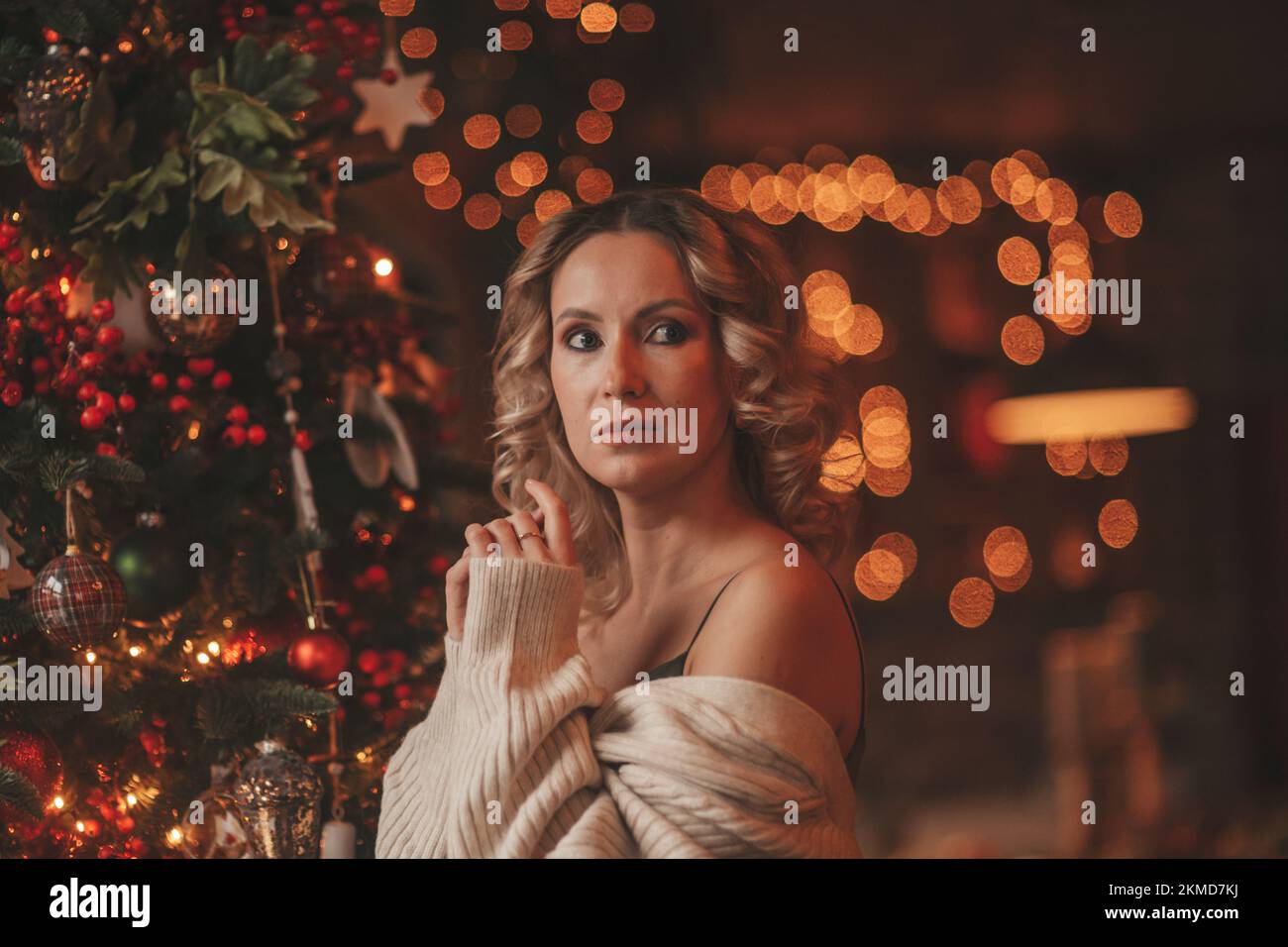 Portrait of candid authentic woman blonde curly hair dreamer at chalet ...