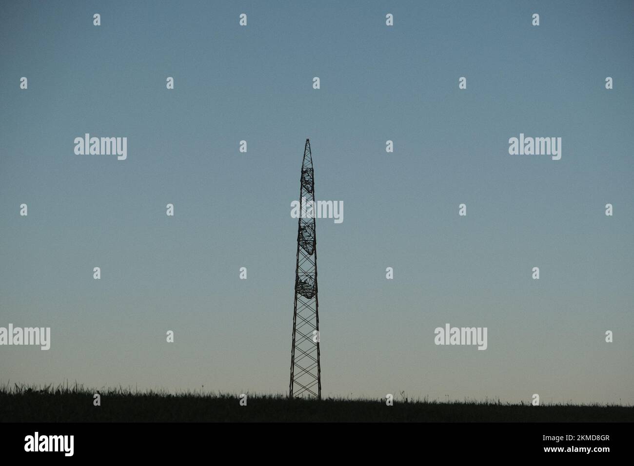 An aerial view of electrical tower in field Stock Photo - Alamy
