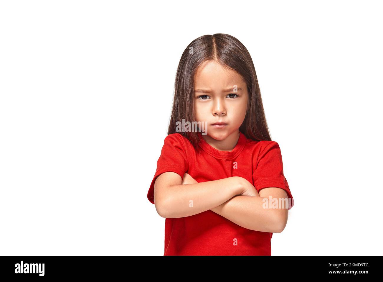 Girl in red t-shirt serious face offended white background Stock Photo ...