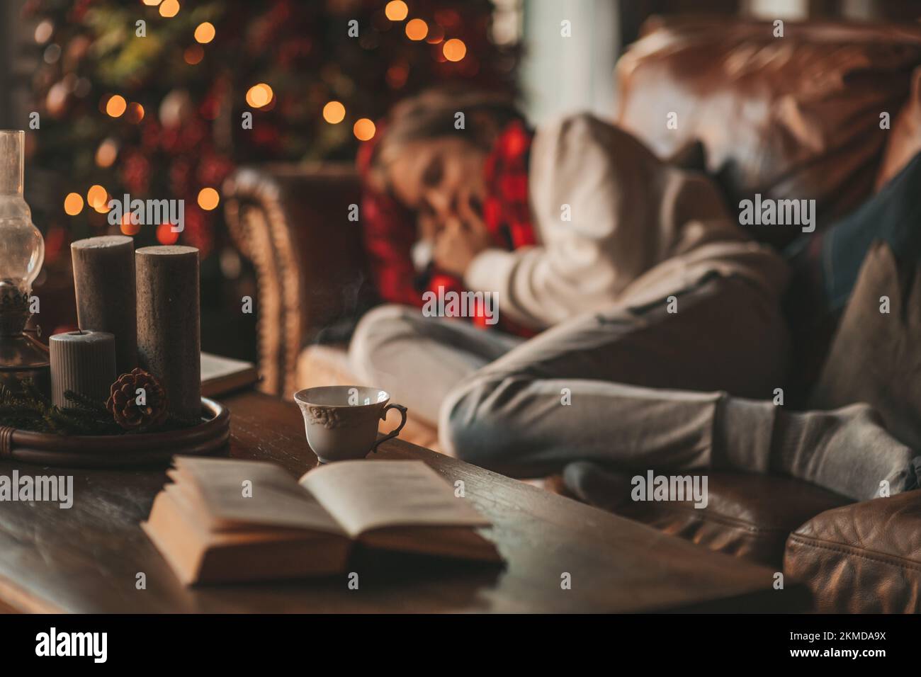 Young teen boy with long hair thoughtful look sad eyes negative mood ...