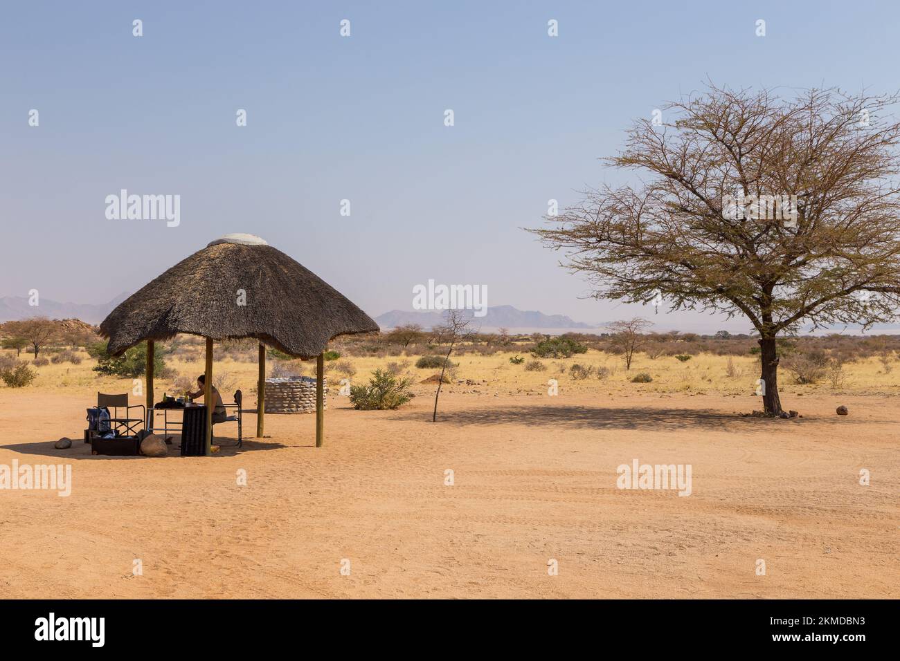 Solitaire, Namibia - 01 October 2018: A girl sitting in the gazebo at ...