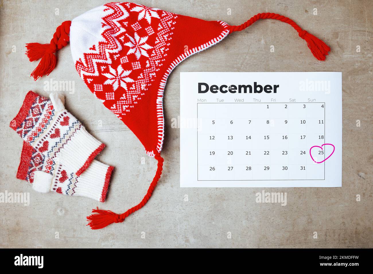 winter flat lay with hat, december calendar and mittens Stock Photo - Alamy