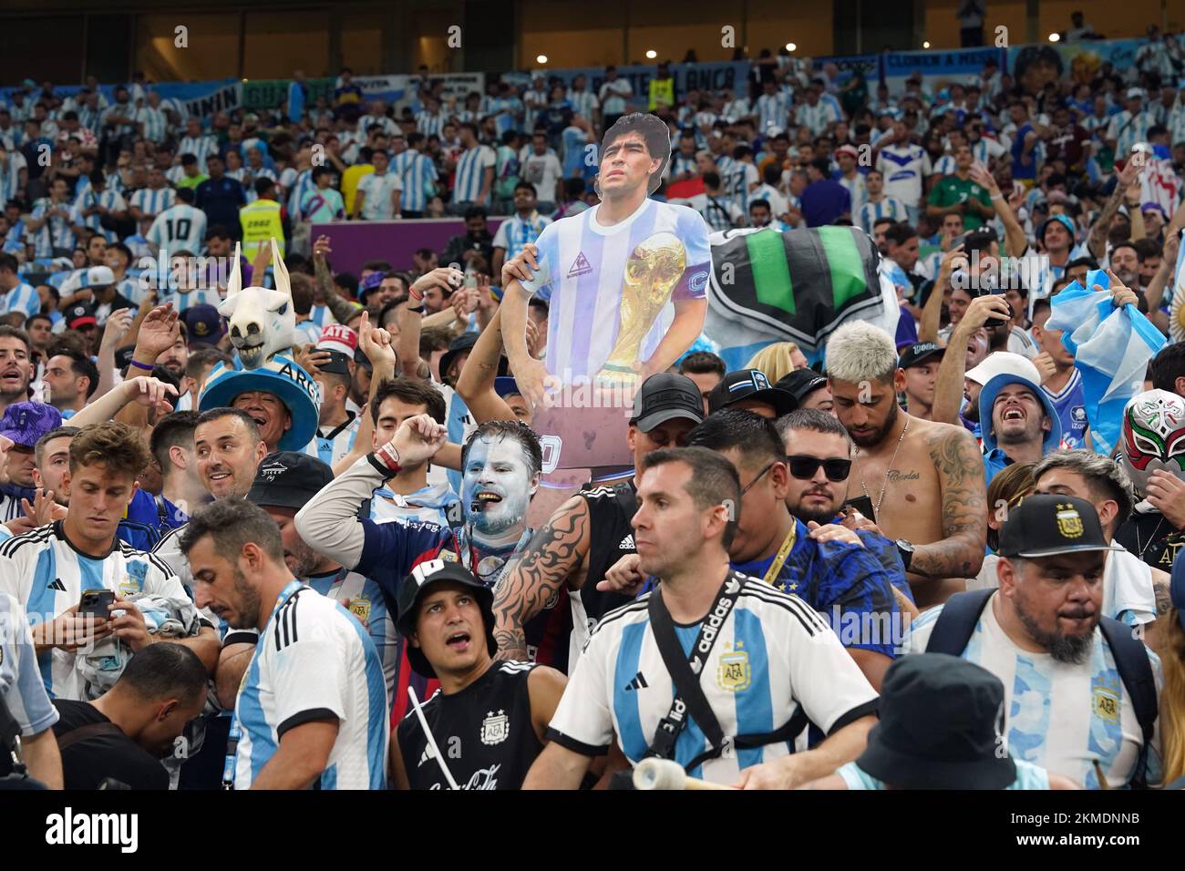 Argentina fans with a Diego Maradona cardboard cut-out in the stadium ...