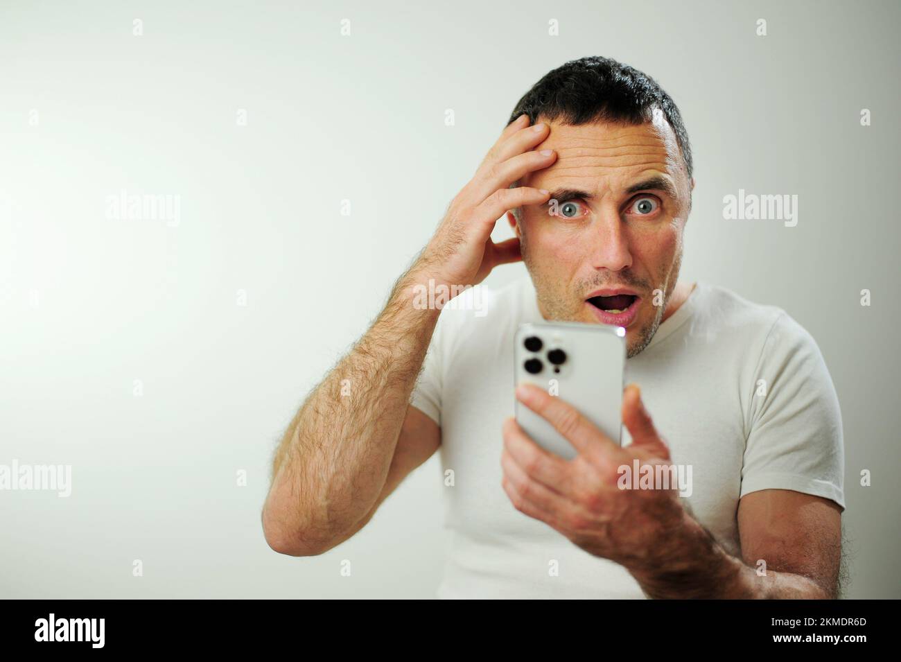 grown man phone green screen chromakey surprised and holding his hand ...