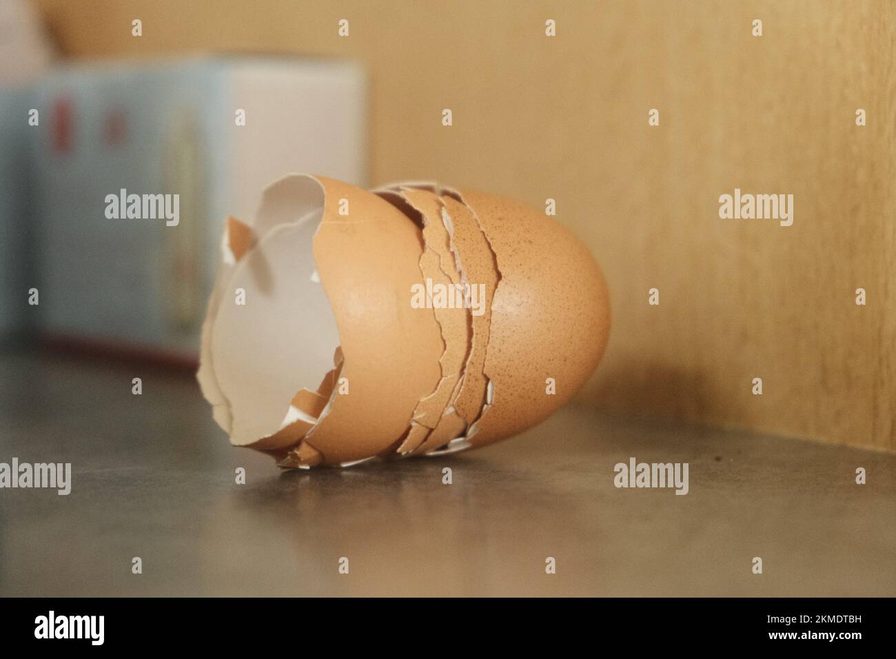 A closeup of egg shells in brown background Stock Photo - Alamy