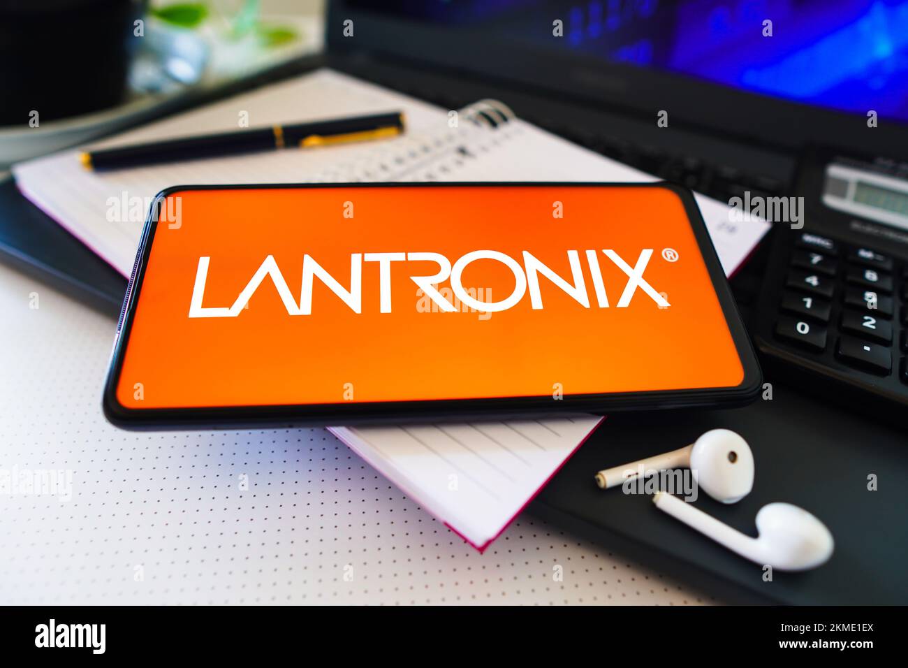 In this photo illustration, the Lantronix logo is displayed on a ...