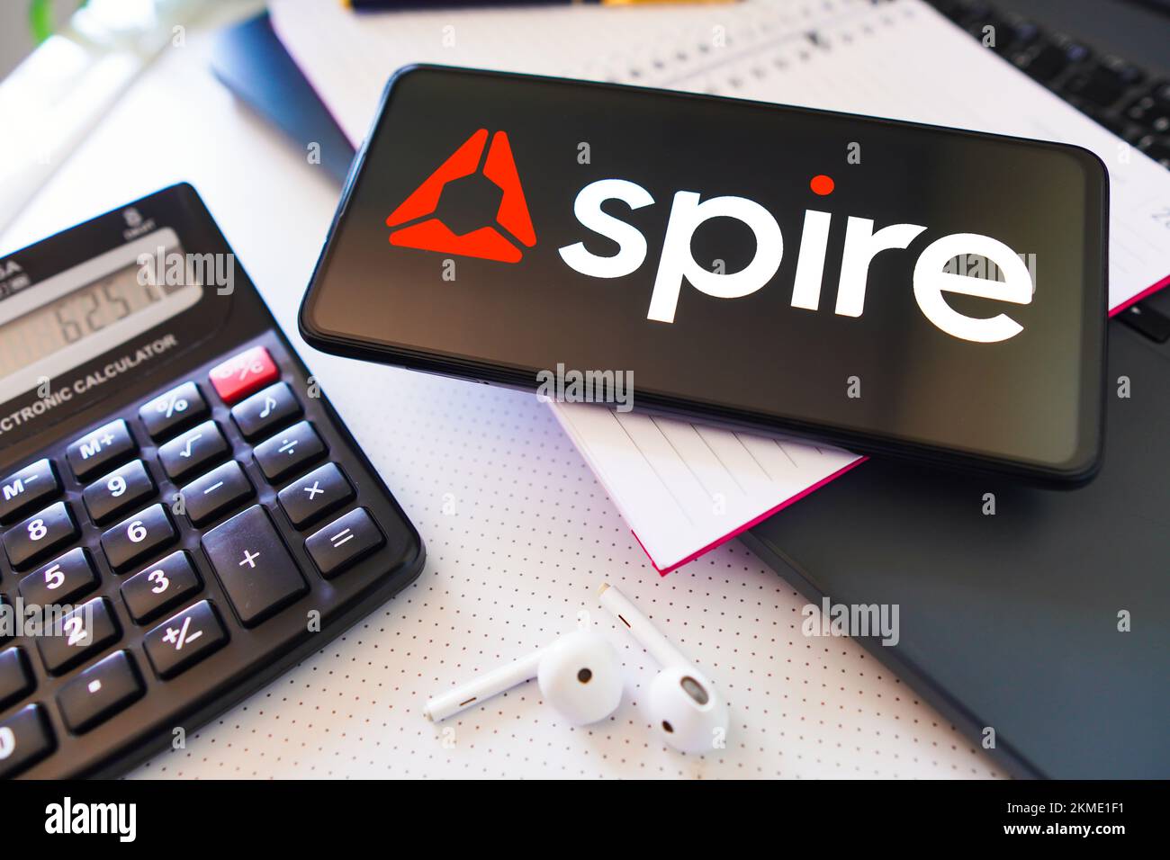 In this photo illustration, the Spire Global logo is displayed on a ...