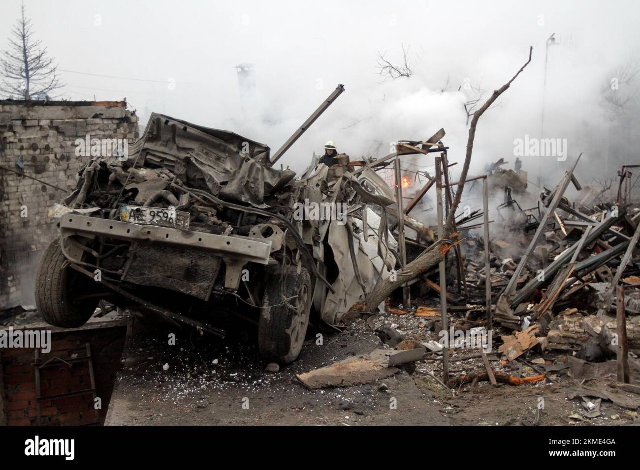 DNIPRO, UKRAINE - NOVEMBER 26, 2022 - The wreckage of a car is pictured ...