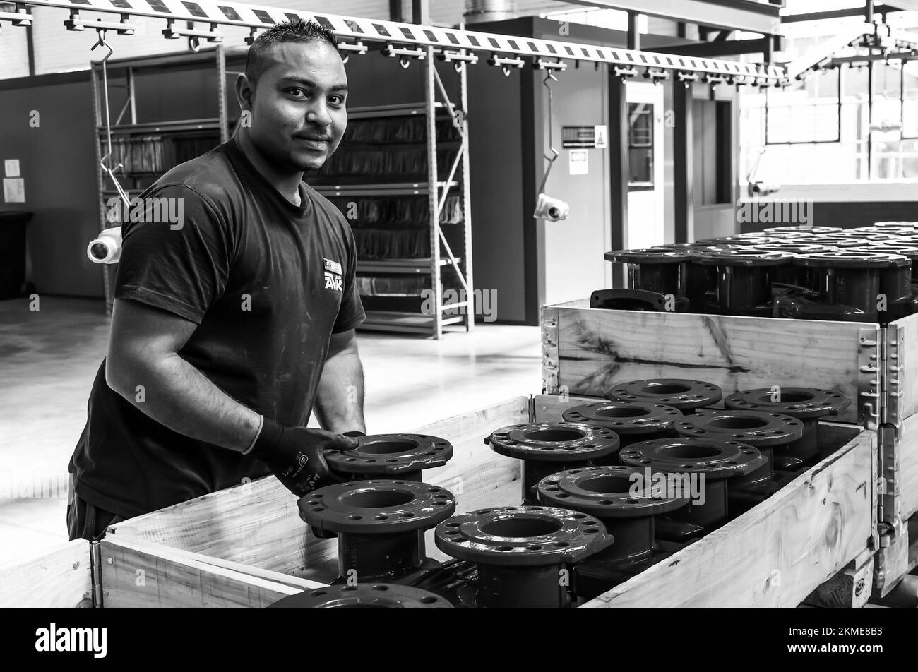 A closeup of a man in industrial Valve Manufacturing and Assembly ...