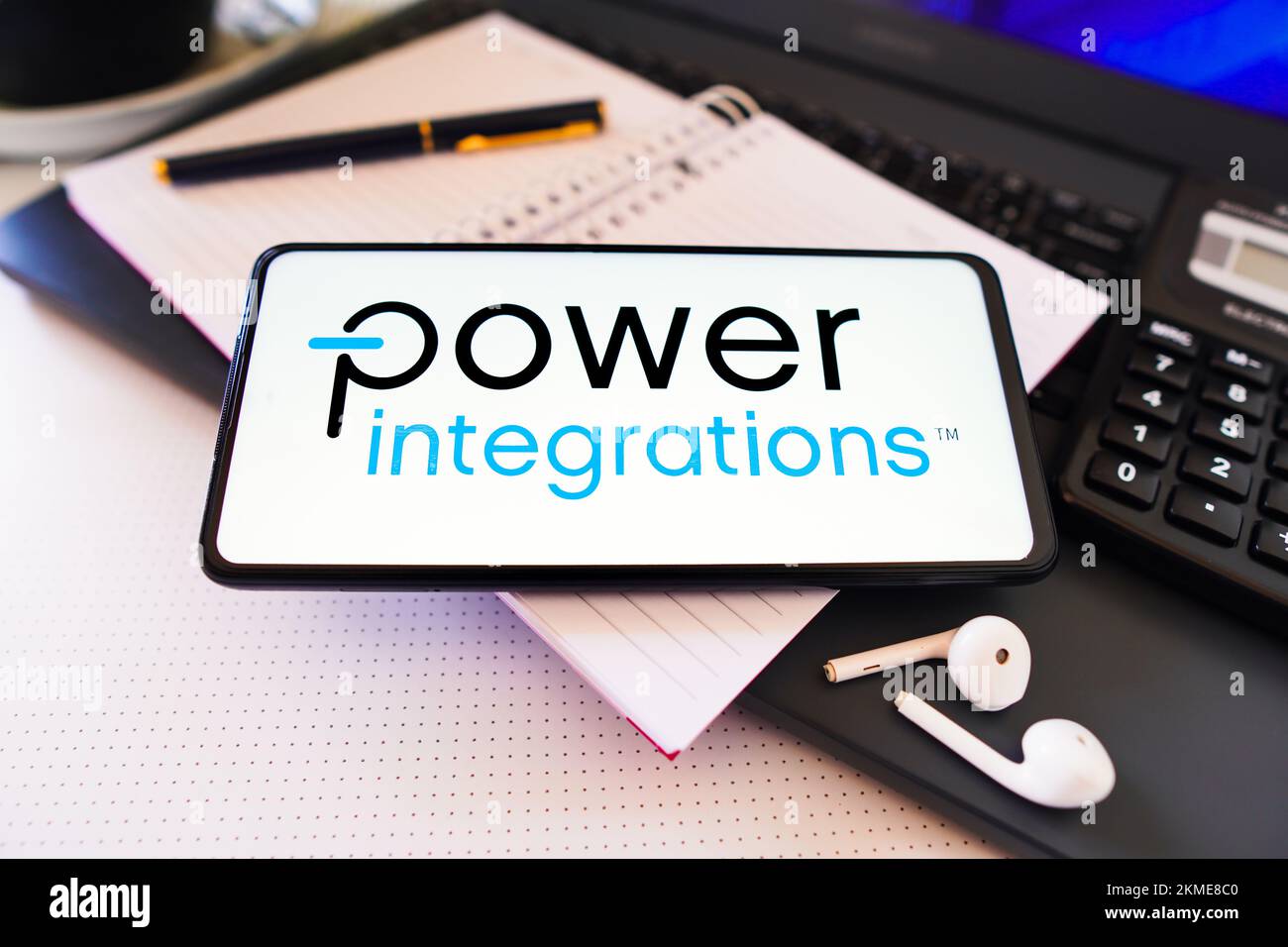 In this photo illustration, the Power Integrations logo is displayed on ...