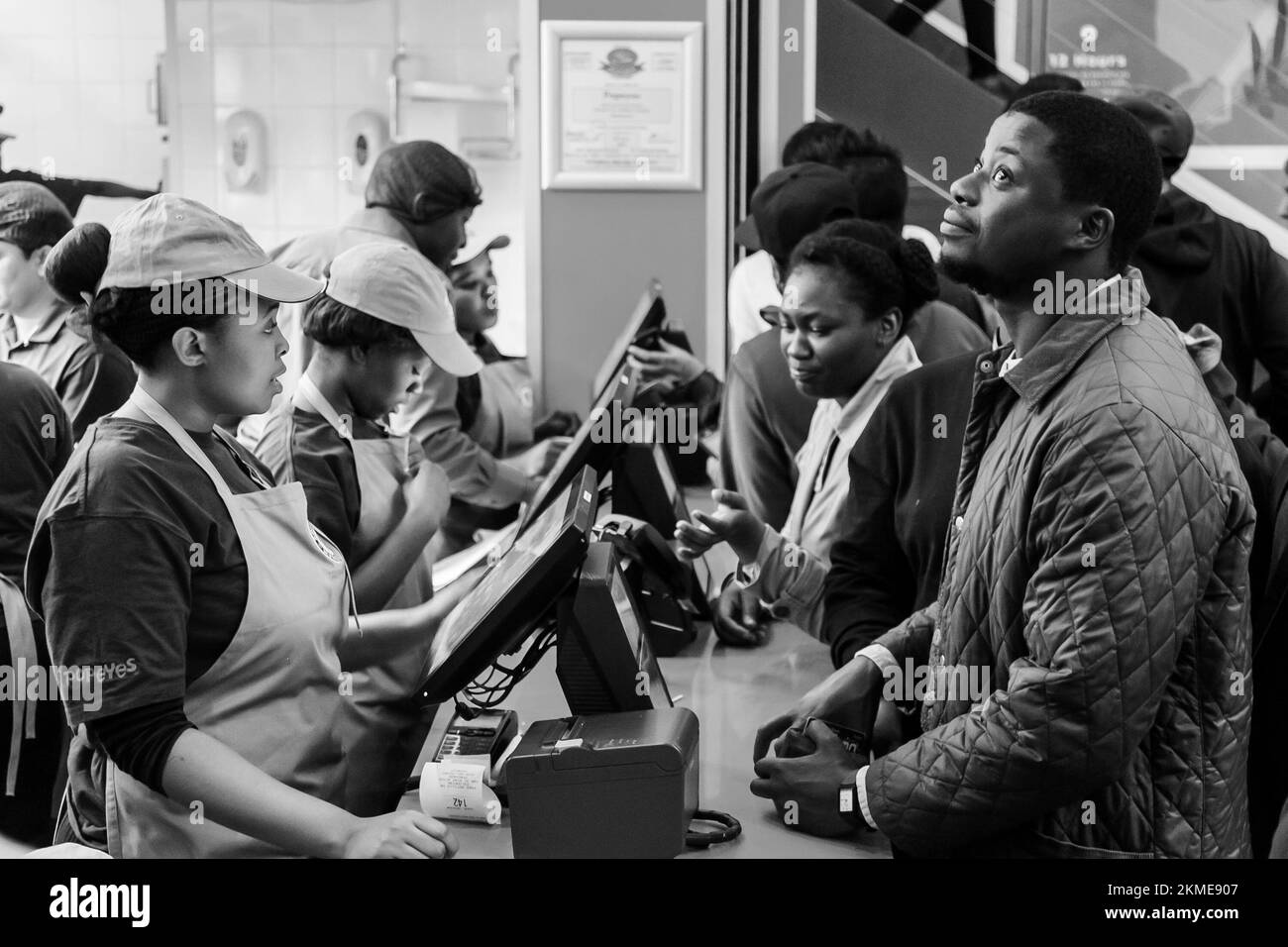 A view of customers at a Popeyes Take Out Fast Food Restaurant Stock ...
