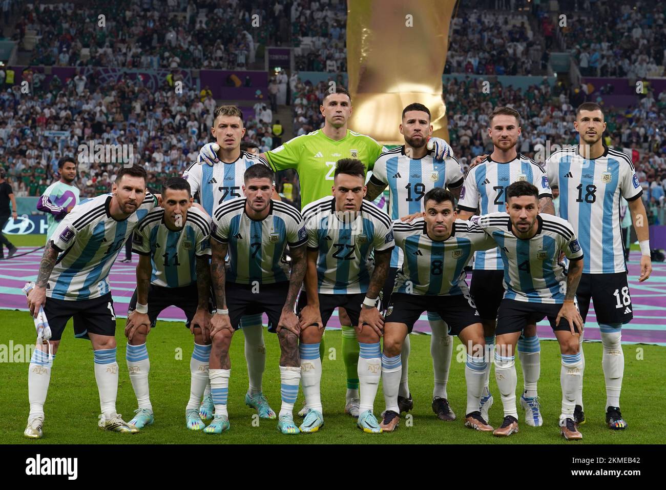 Argentina's Lionel Messi (left) lining up with his team-mates prior to ...