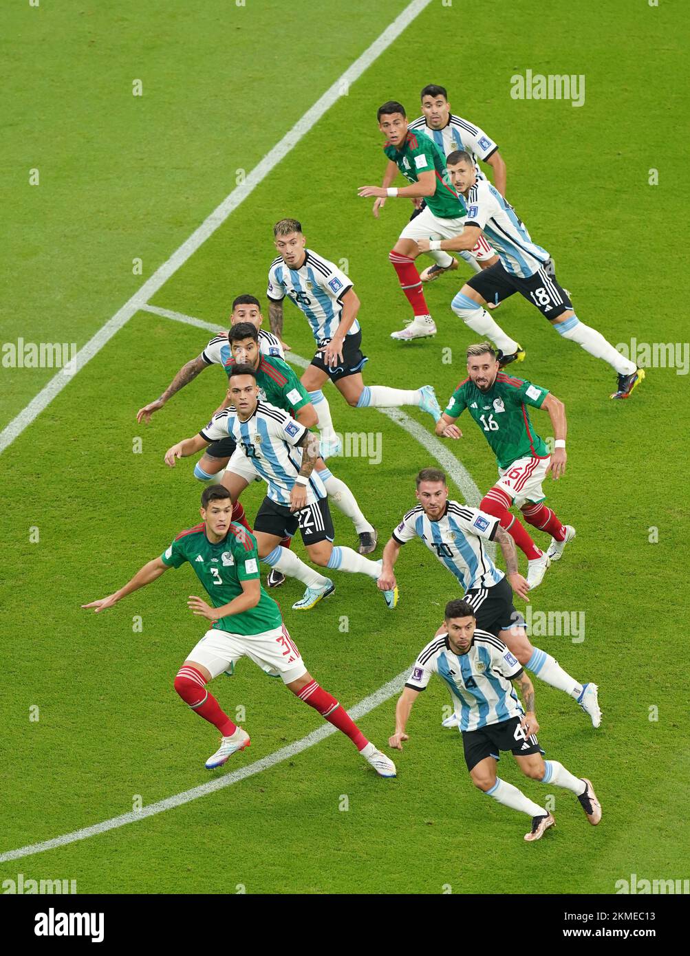 Players scramble to the penalty area during the FIFA World Cup Group C match at the Lusail ...