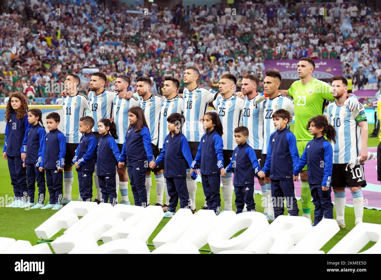 Argentina's Lionel Messi (right) lining up with his team-mates prior to ...