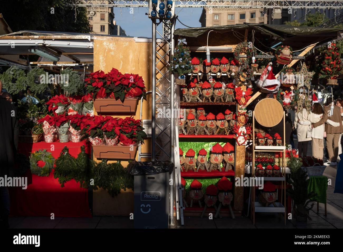 Decorative objects for Christmas are seen hanging in the stalls of the ...
