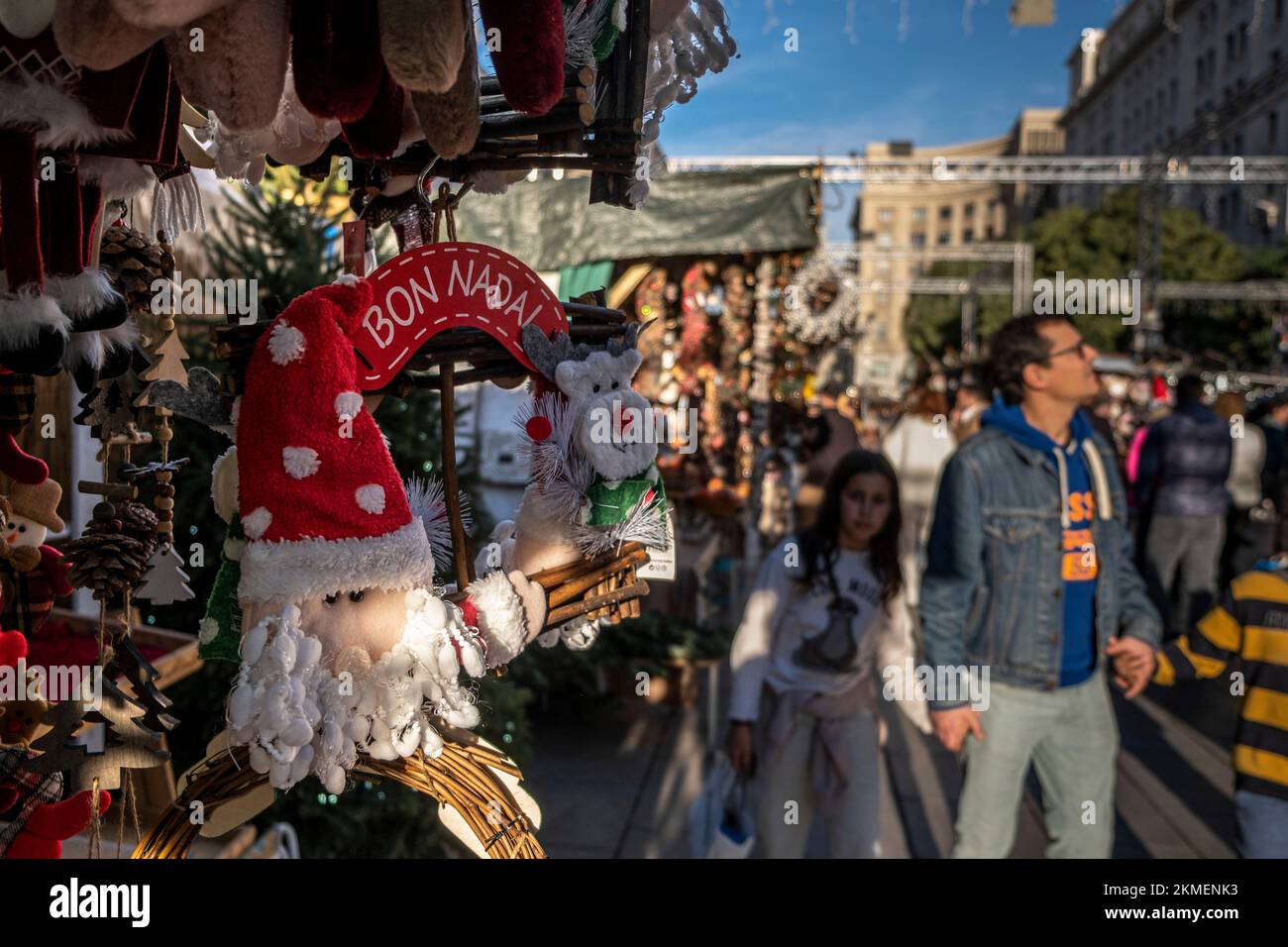 A Santa Claus wishing Merry Christmas is seen in one of the stalls at ...