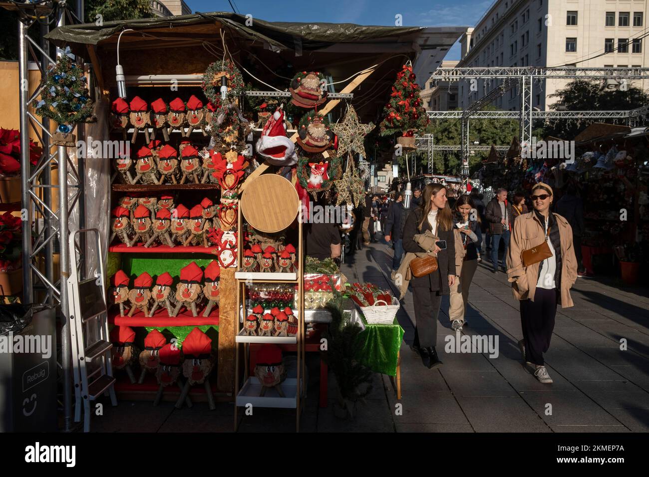 Decorative objects for Christmas are seen hanging in the stalls of the ...