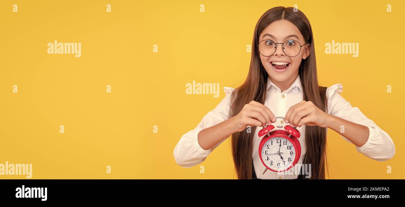 school kid in uniform and glasses showing time. you are late. deadline ...