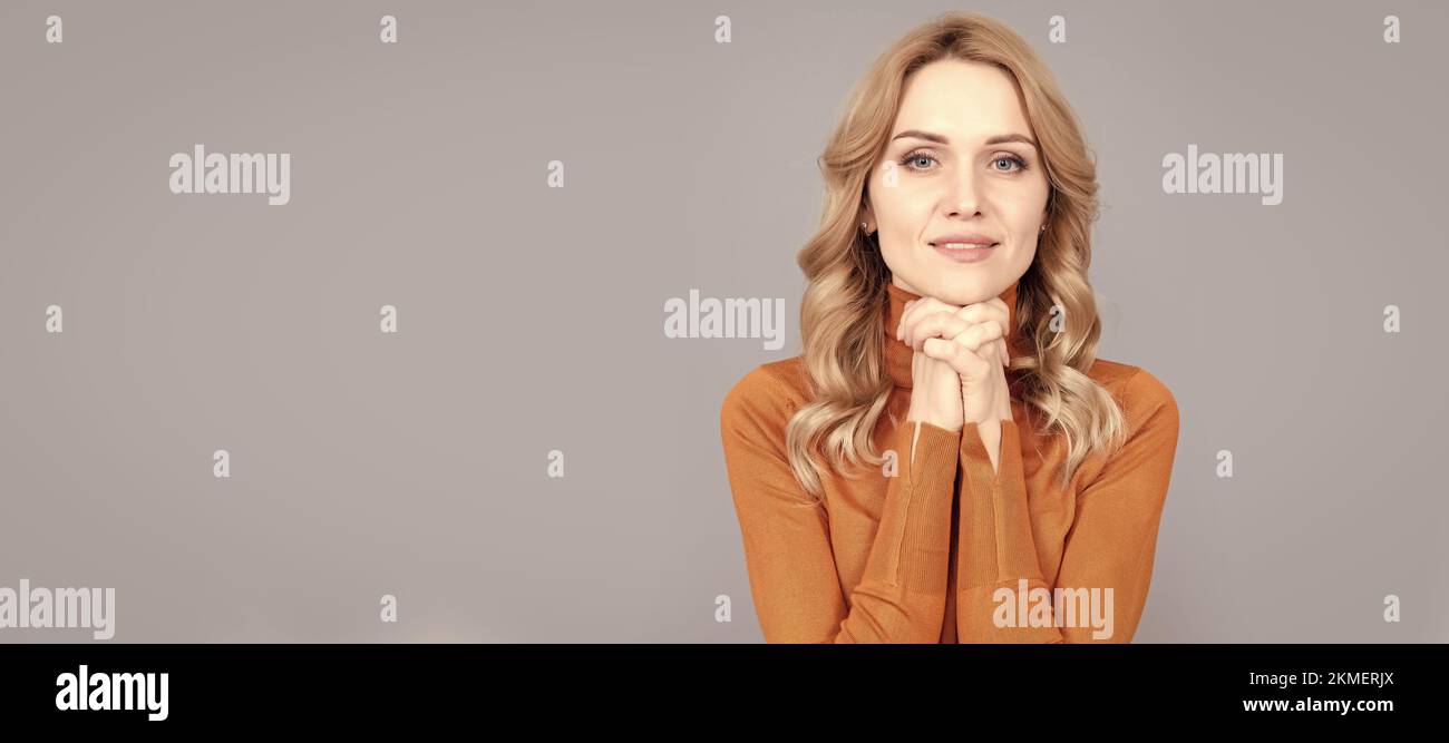 beautiful blonde woman has curly hair hold hands, fashion. Woman ...