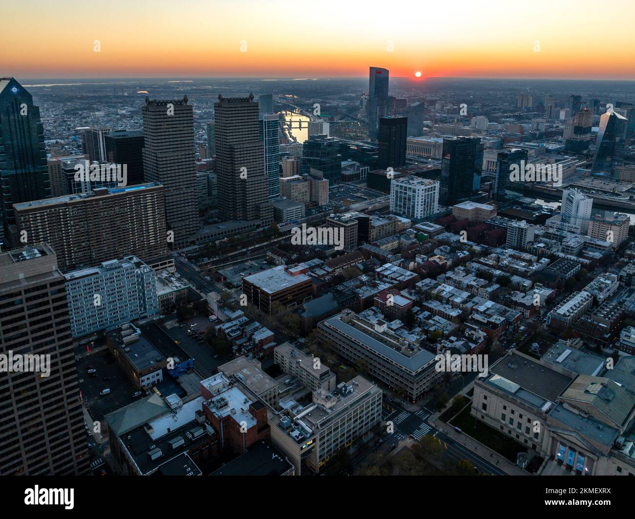 A high-angle drone shot of skyscrapers and residential buildings in ...