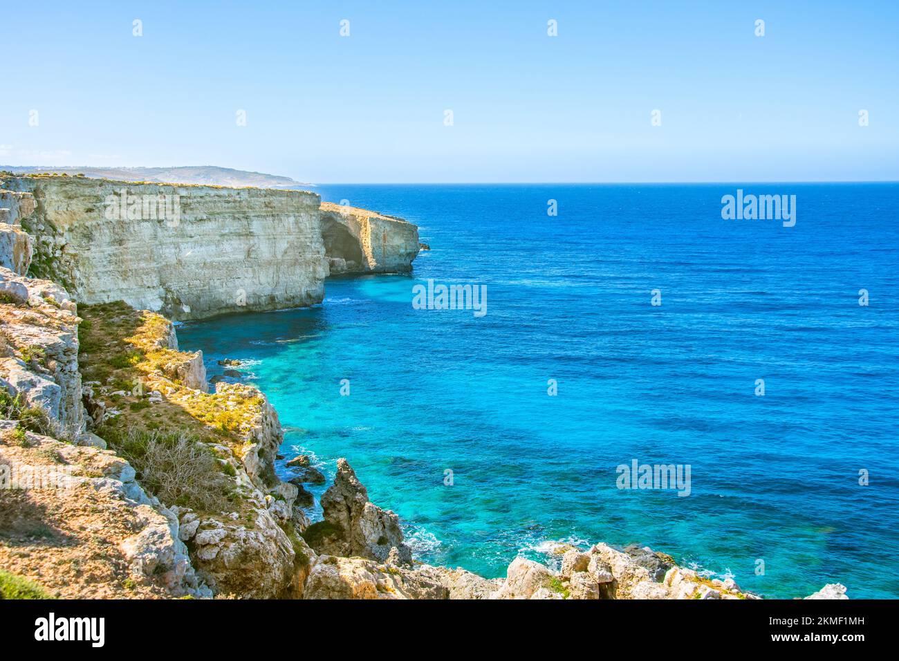 Cliff on the picturesque coast of the Mediterranean Sea with turquoise ...
