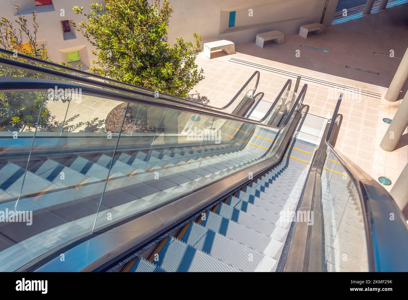 Staircase escalator bottom view on the outside street in the courtyard ...