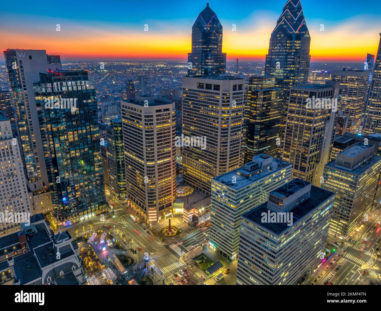 A drone shot of skyscrapers and a wide highway in Philadelphia in the ...