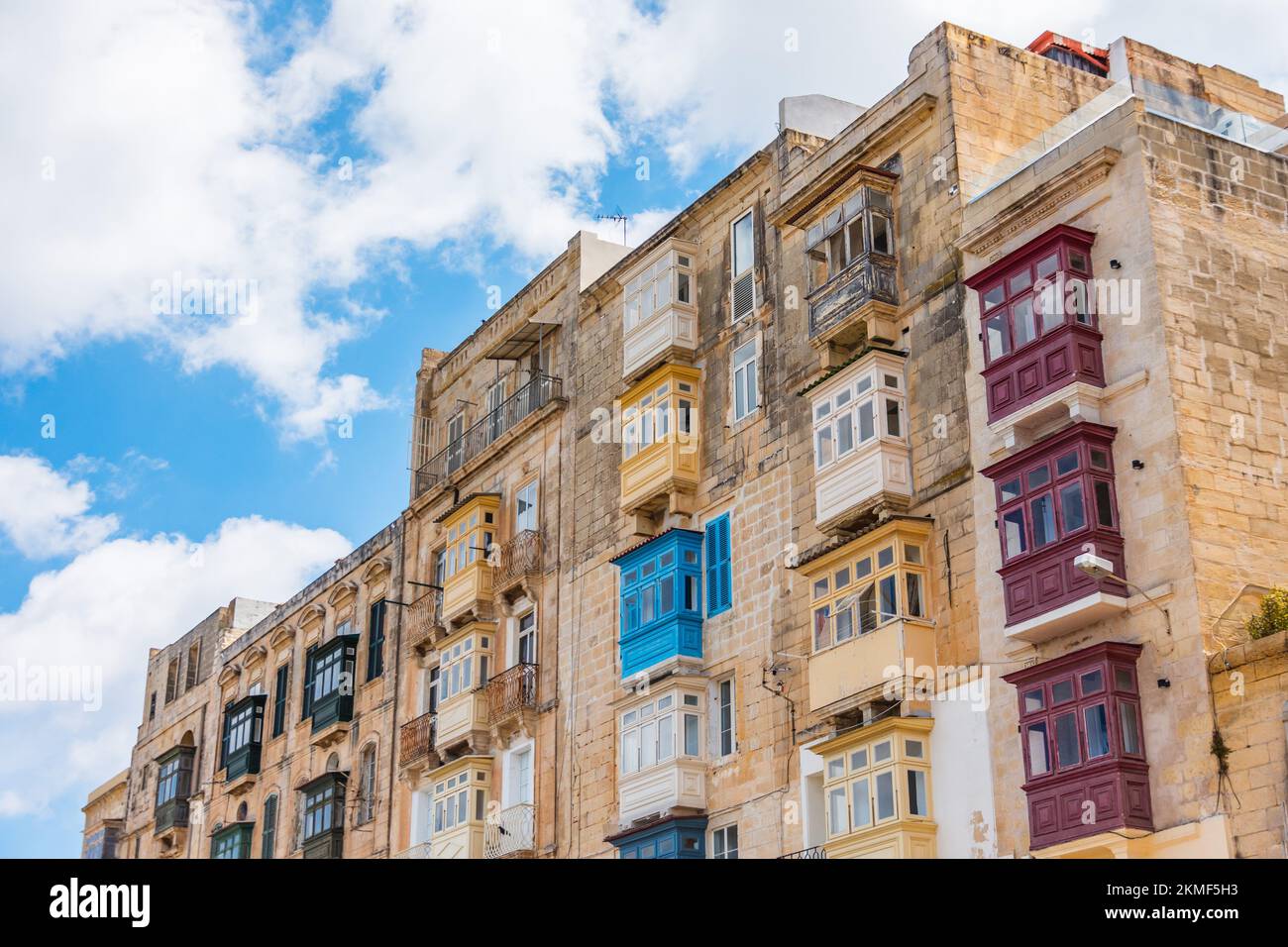 Many typical traditional balconies in a residential building of the ...