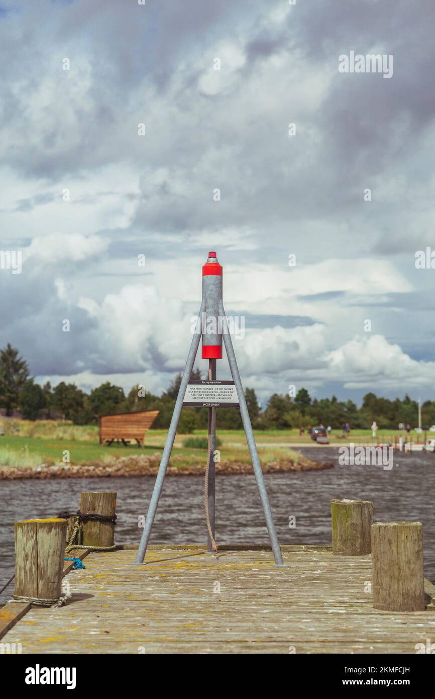 Signal rocket on the pier Stock Photo - Alamy