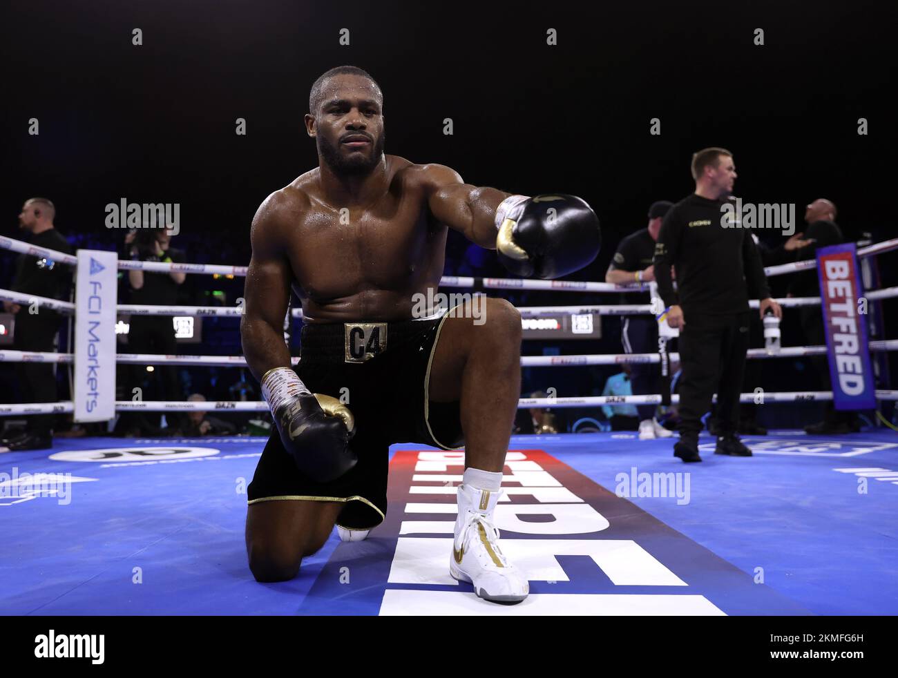 Cheavon Clarke celebrates victory in the cruiser weight bout at the OVO ...