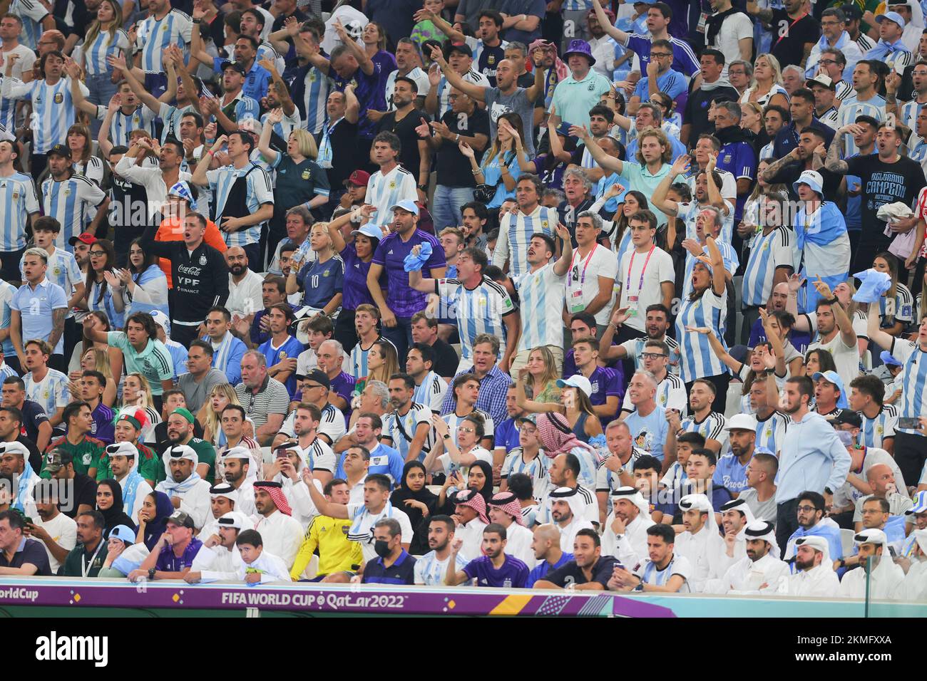 Lusail, Qatar. 26th Nov, 2022. Argentina fans sing and dance during the ...