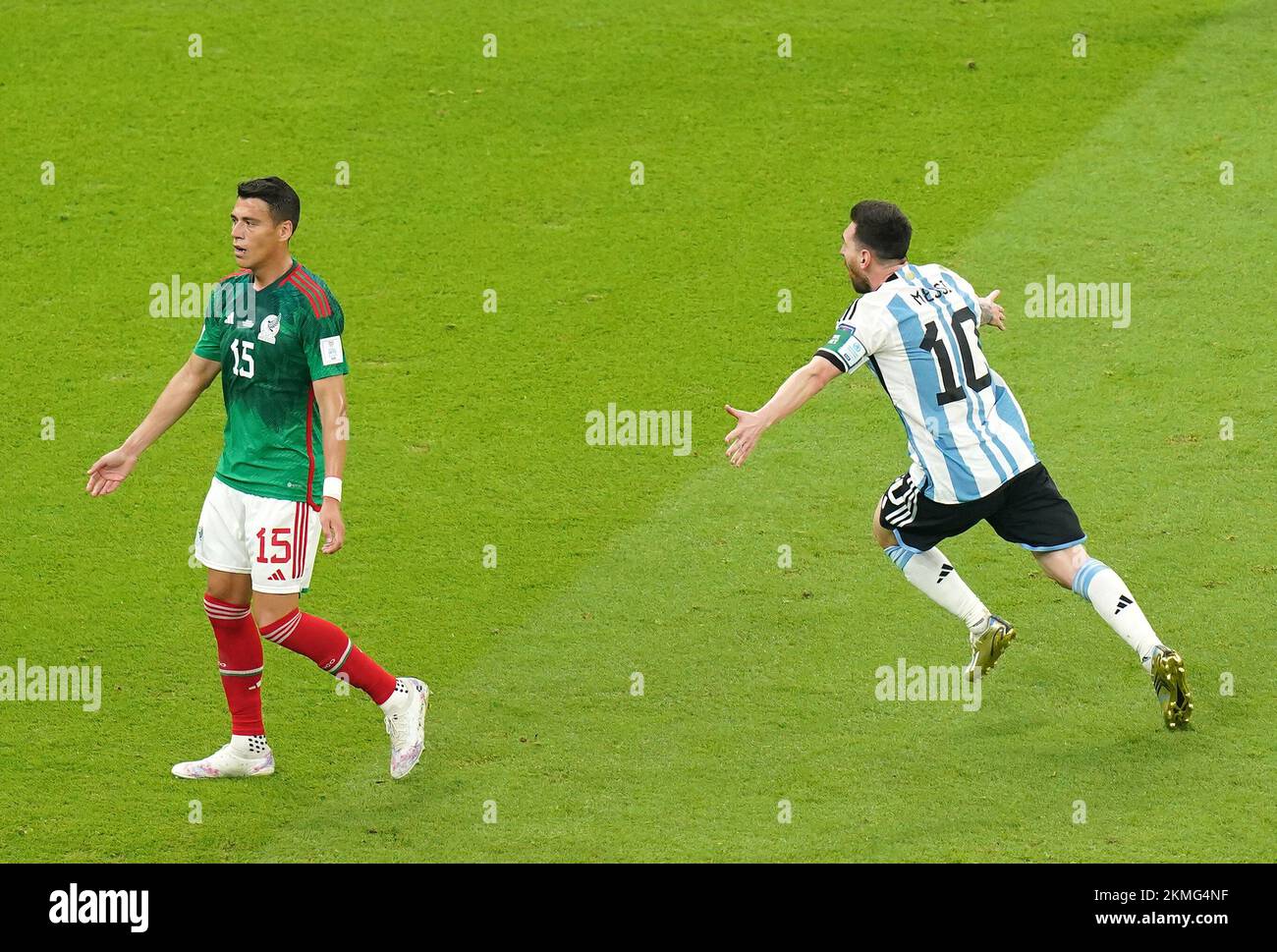Argentina's Lionel Messi (right) celebrates scoring their side's first ...