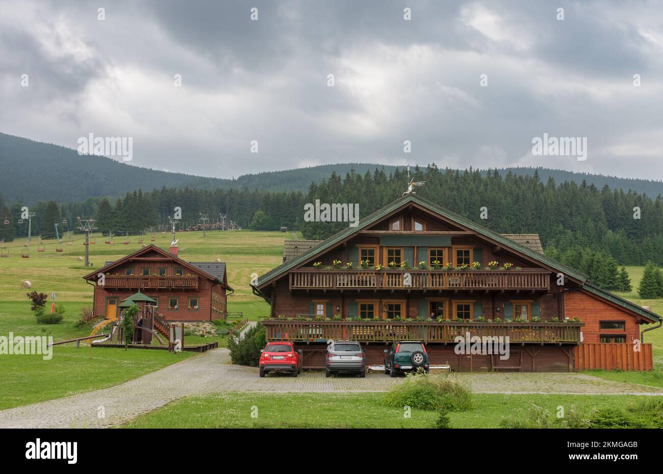 Mountain village in Jesenik mountains. Lower station of chairlift. Ski ...