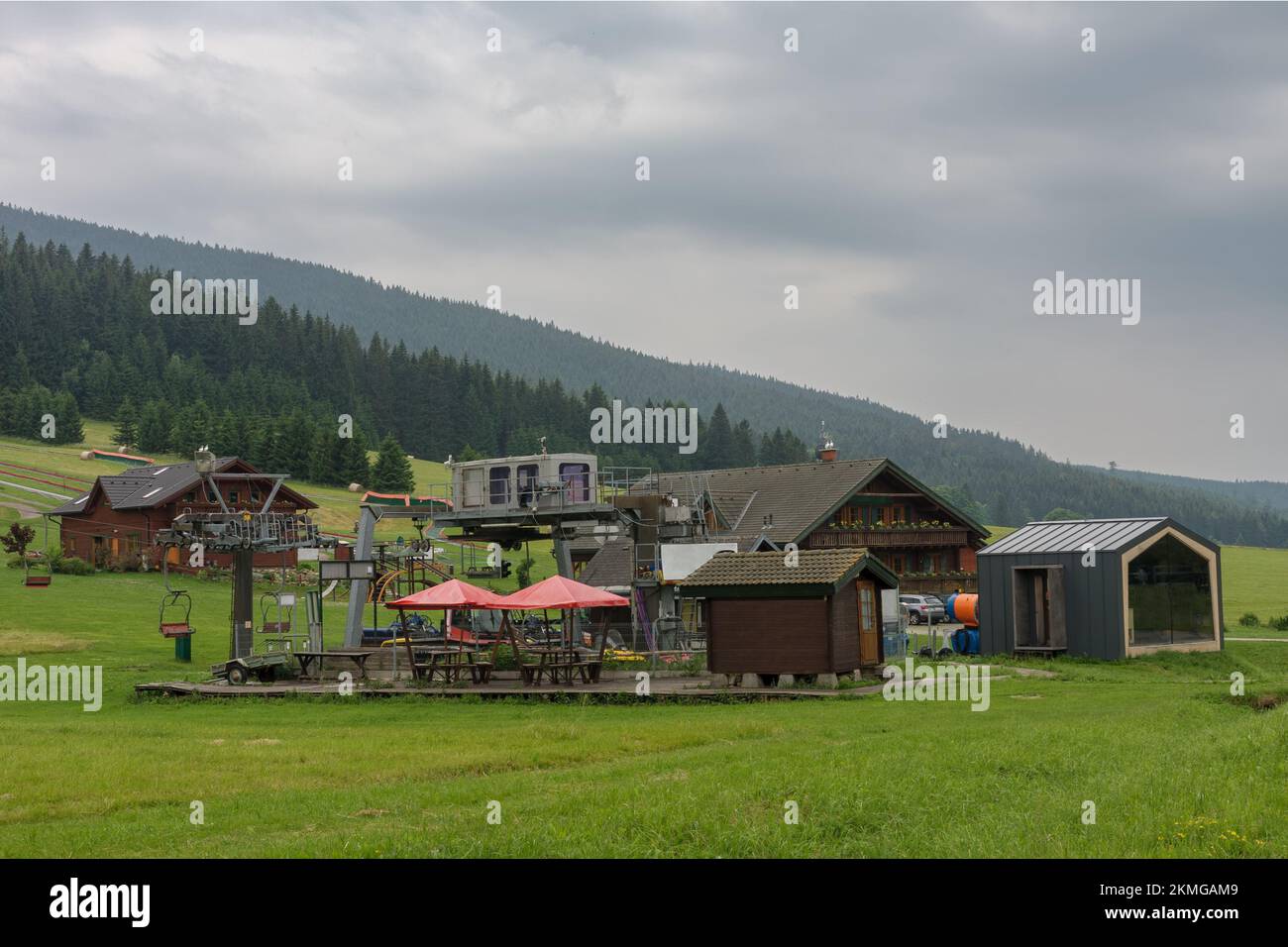Mountain village in Jesenik mountains. Lower station of chairlift. Ski ...
