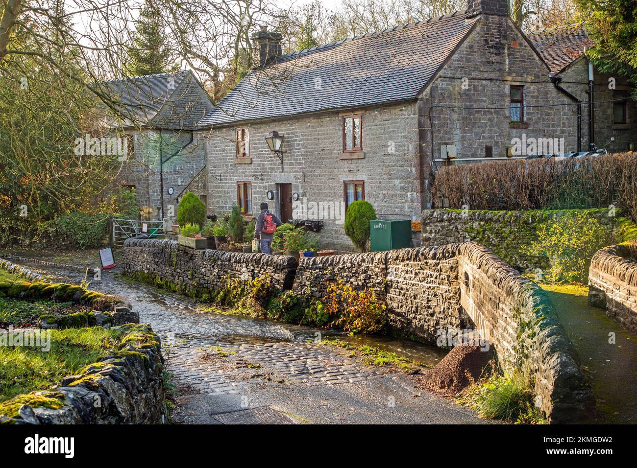 Hoo Brook flowing through the ford over the cobbled main street in the ...