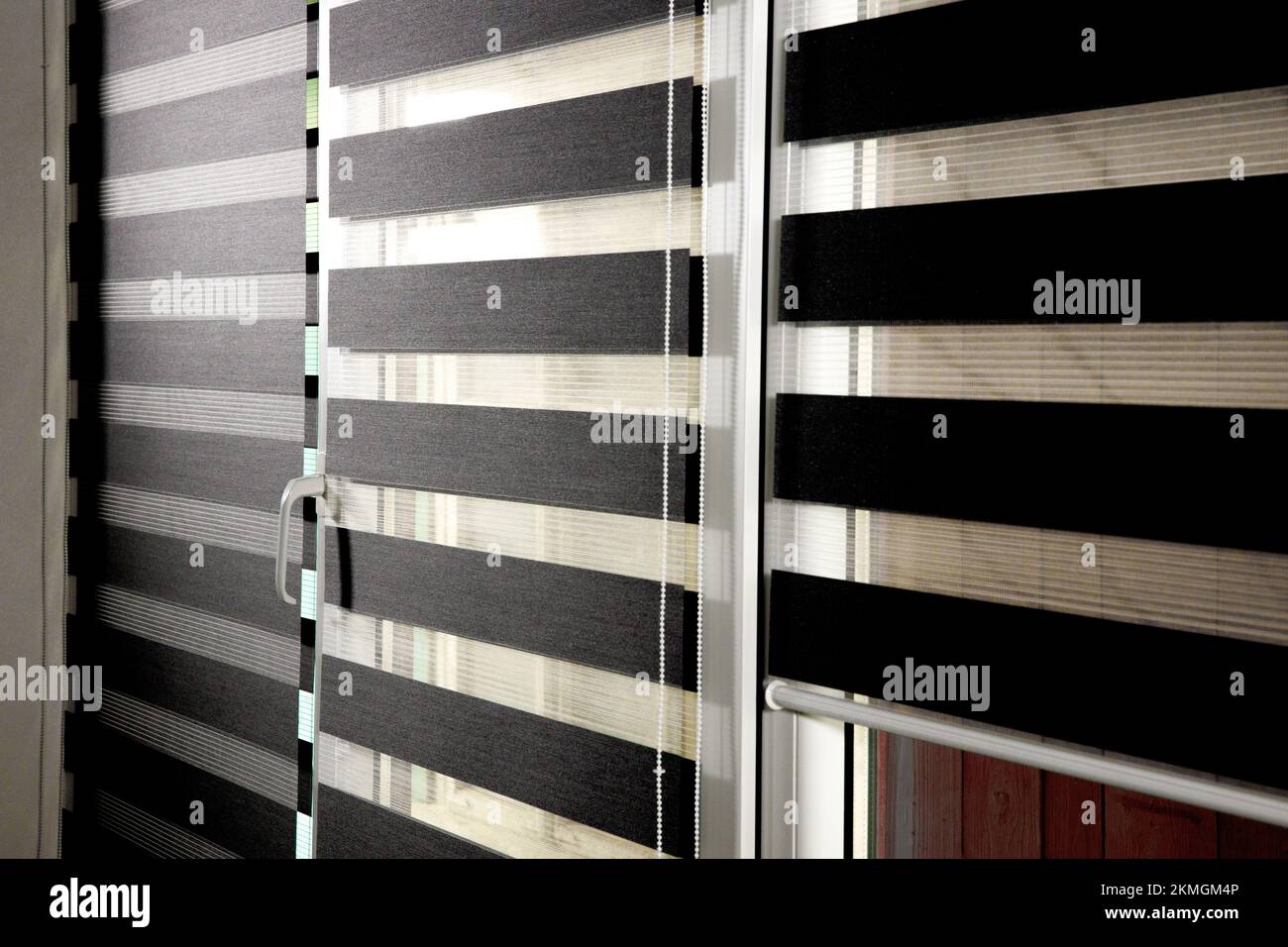 Window roller duo system day and night. Close up on roll curtains ...