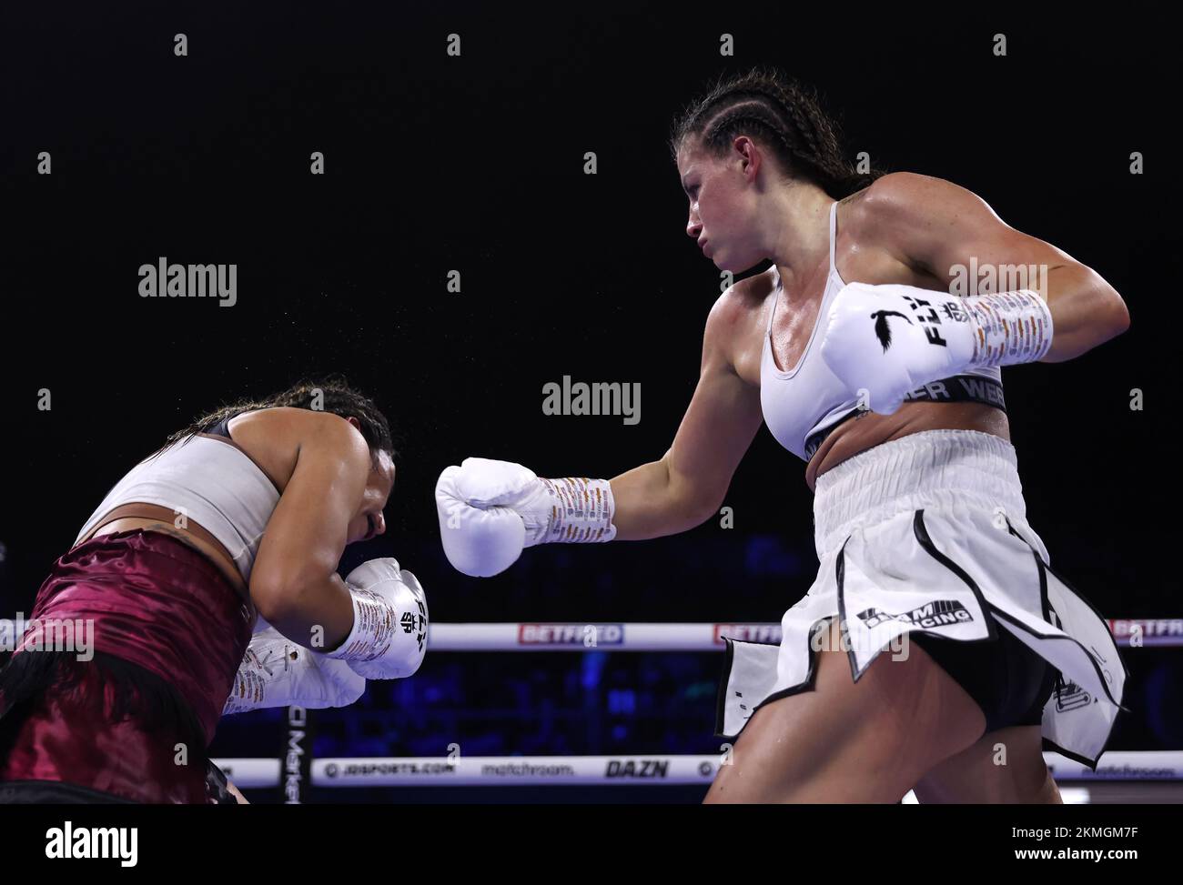 Sandy Ryan (right) and Anahi Ester Sanchez in the WBC International Super Light weight bout at ...