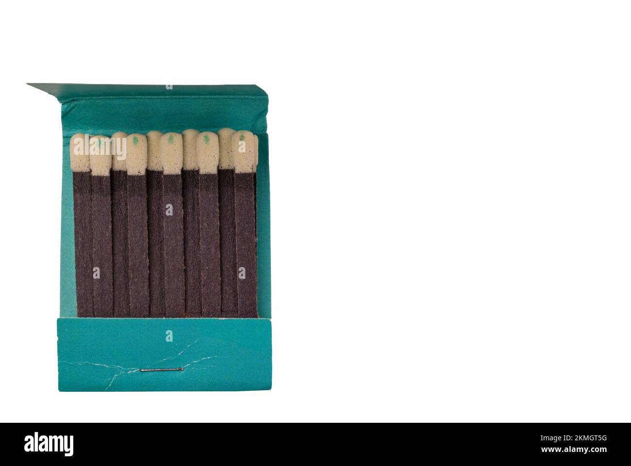 Close up view of matches in cardboard green pack on white background ...